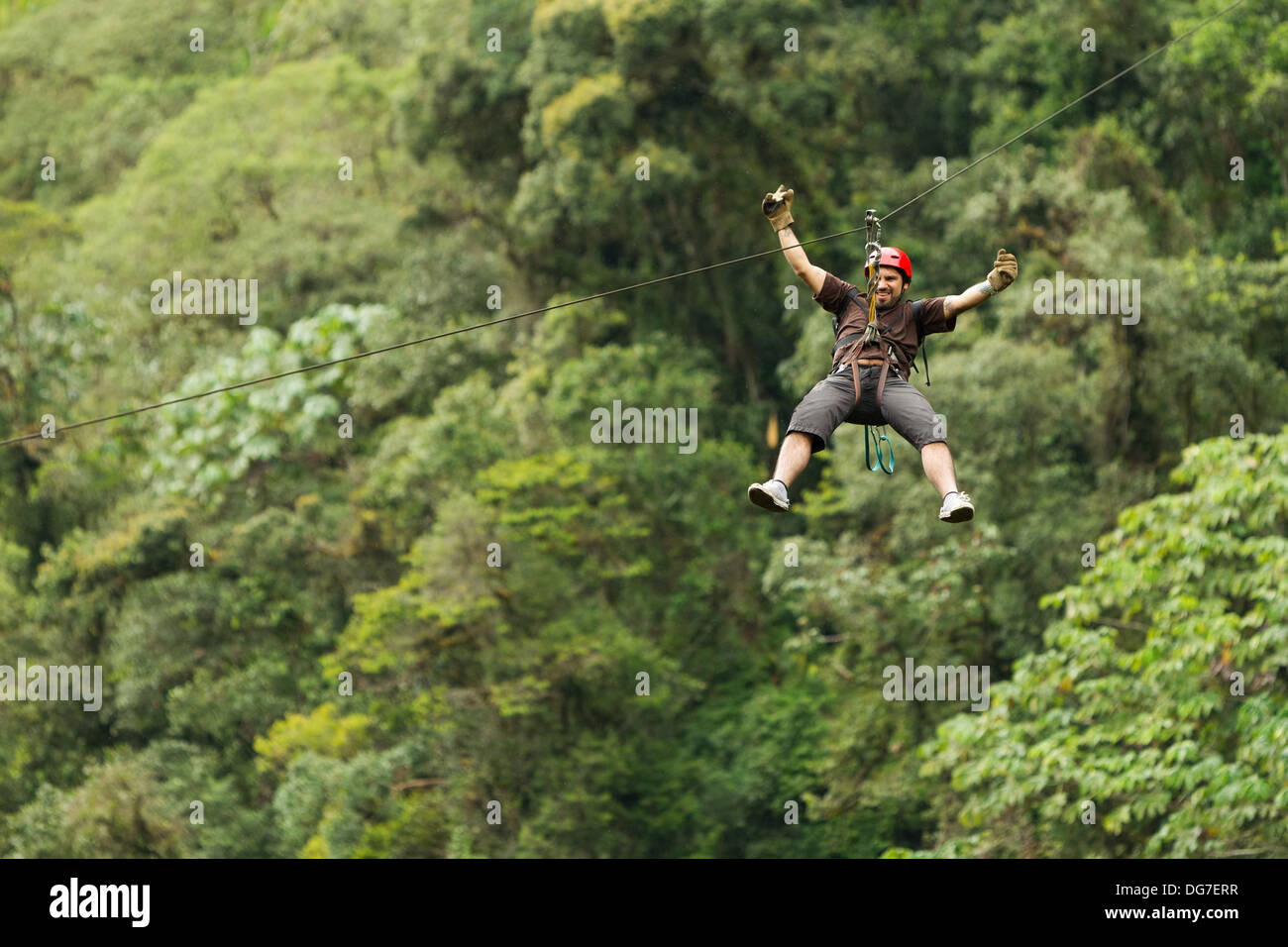 Adult Man Zip Line Adventure In Ecuadorian Rainforest Stock Photo - Alamy