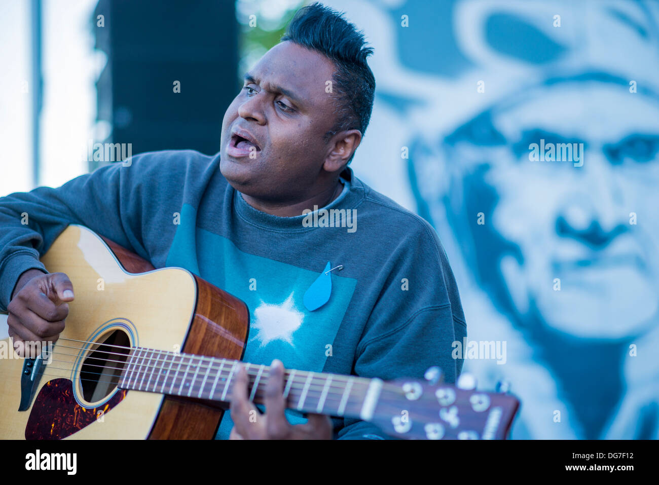 Chin Injeti performs at the Salish Sea Summer Gathering 2013 Stock ...