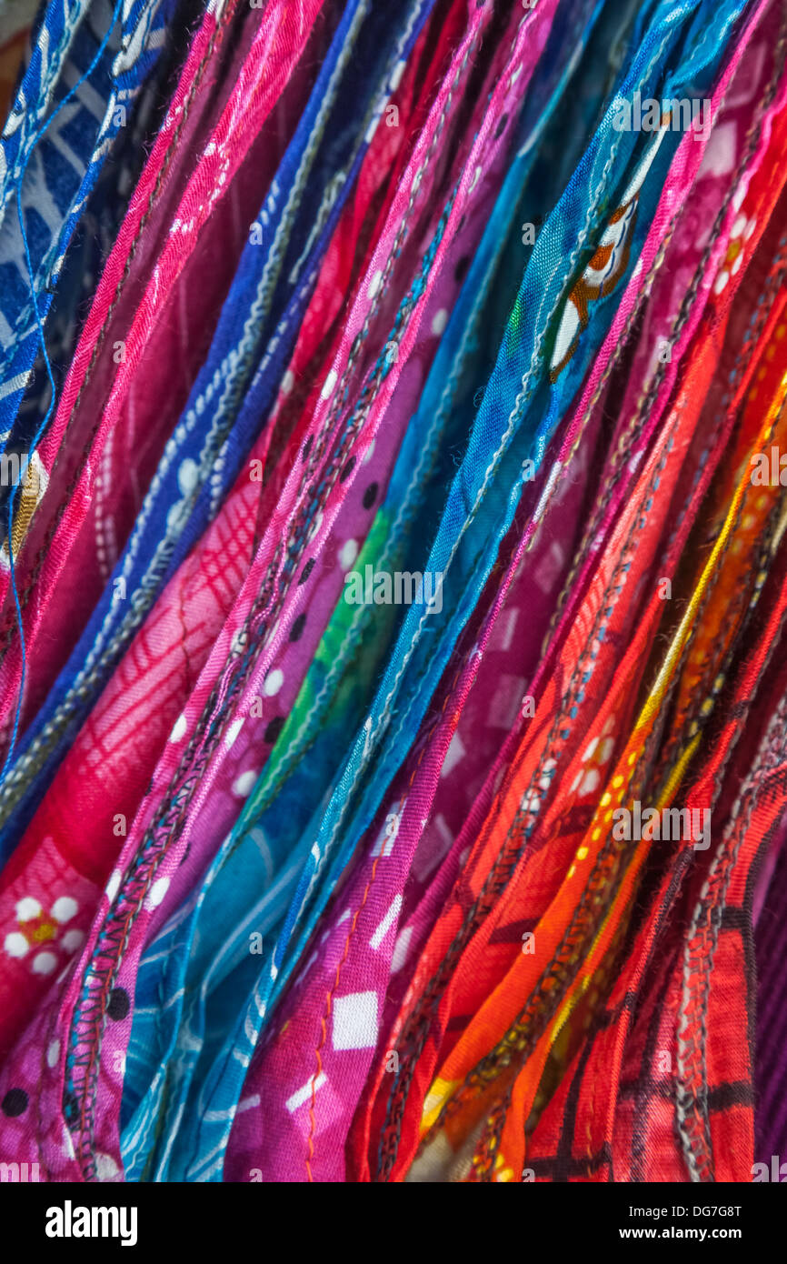 Thailand, Chiang Rai, clothing display at an outdoor street market ...