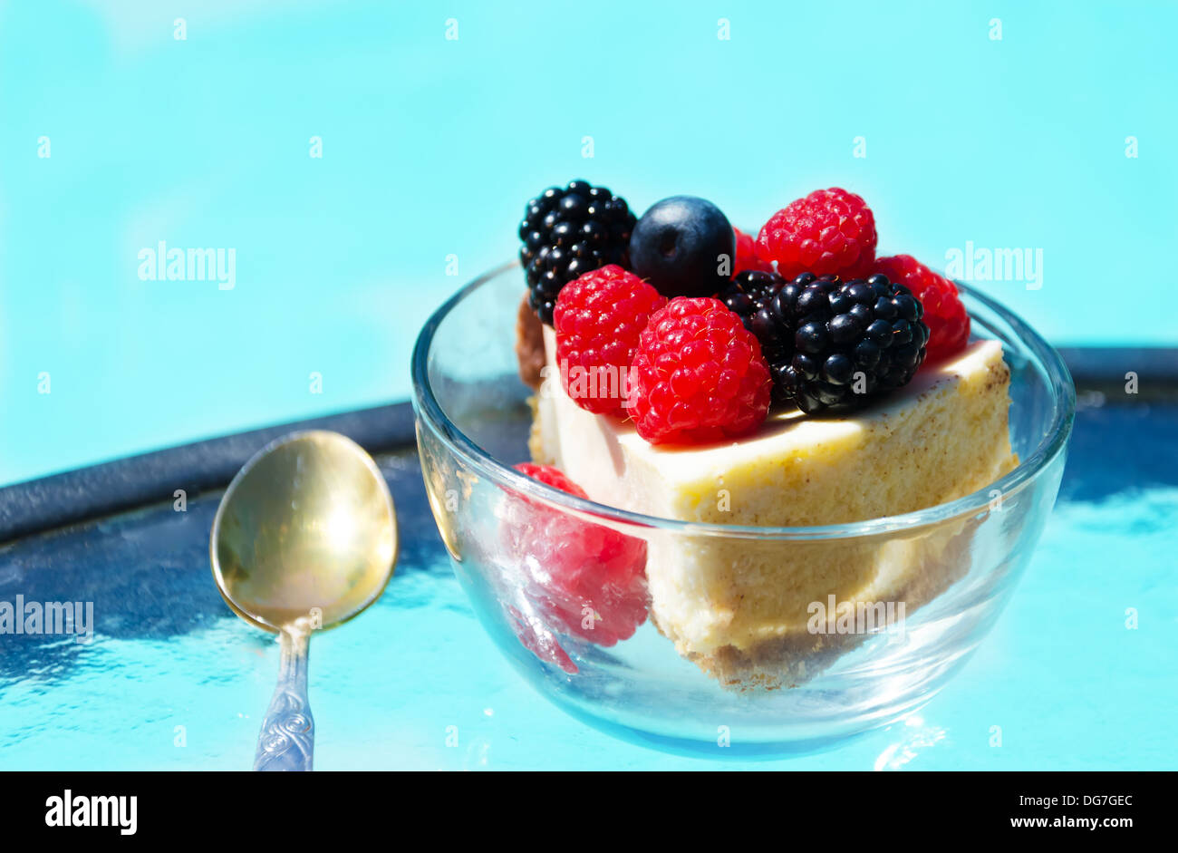 Morning dessert with fresh berries by the swimming pool Stock Photo - Alamy