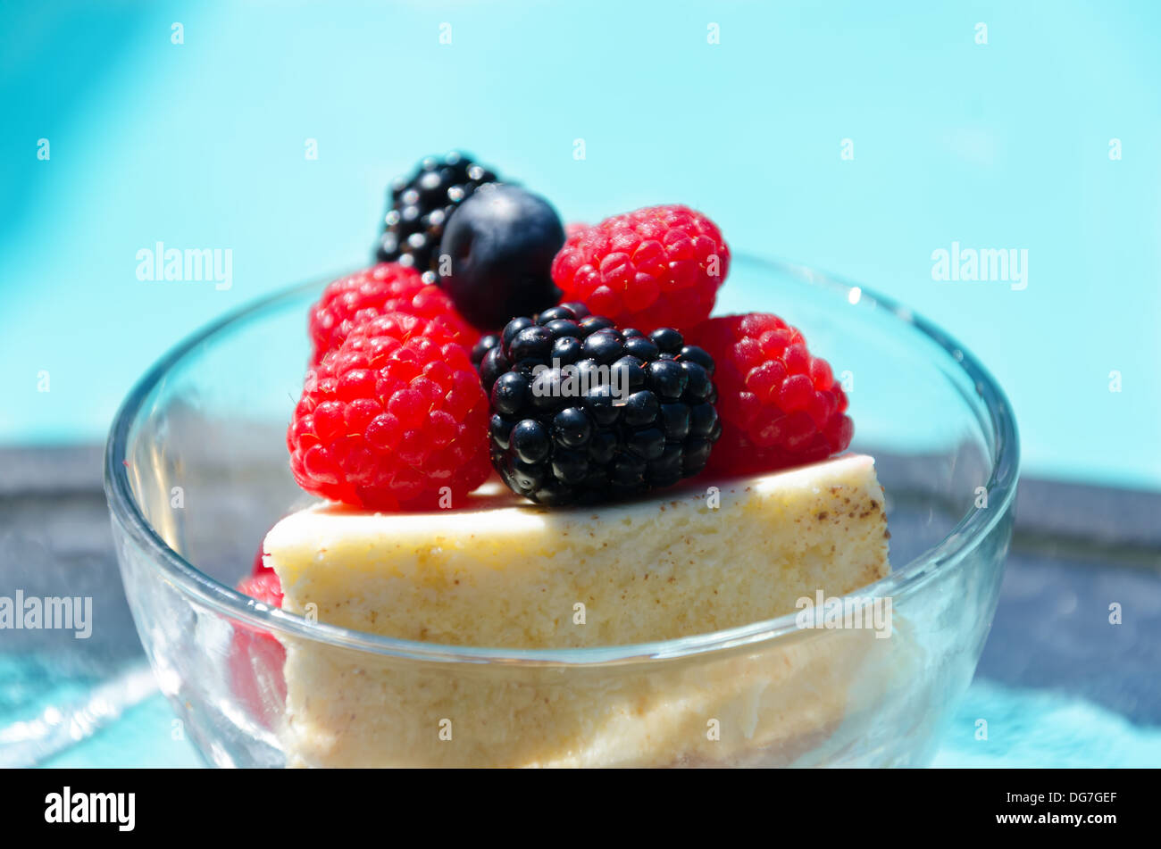 Morning dessert with fresh berries by the swimming pool Stock Photo - Alamy