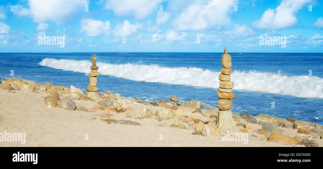 Stack of sea rocks balancing by Pacific ocean Stock Photo - Alamy