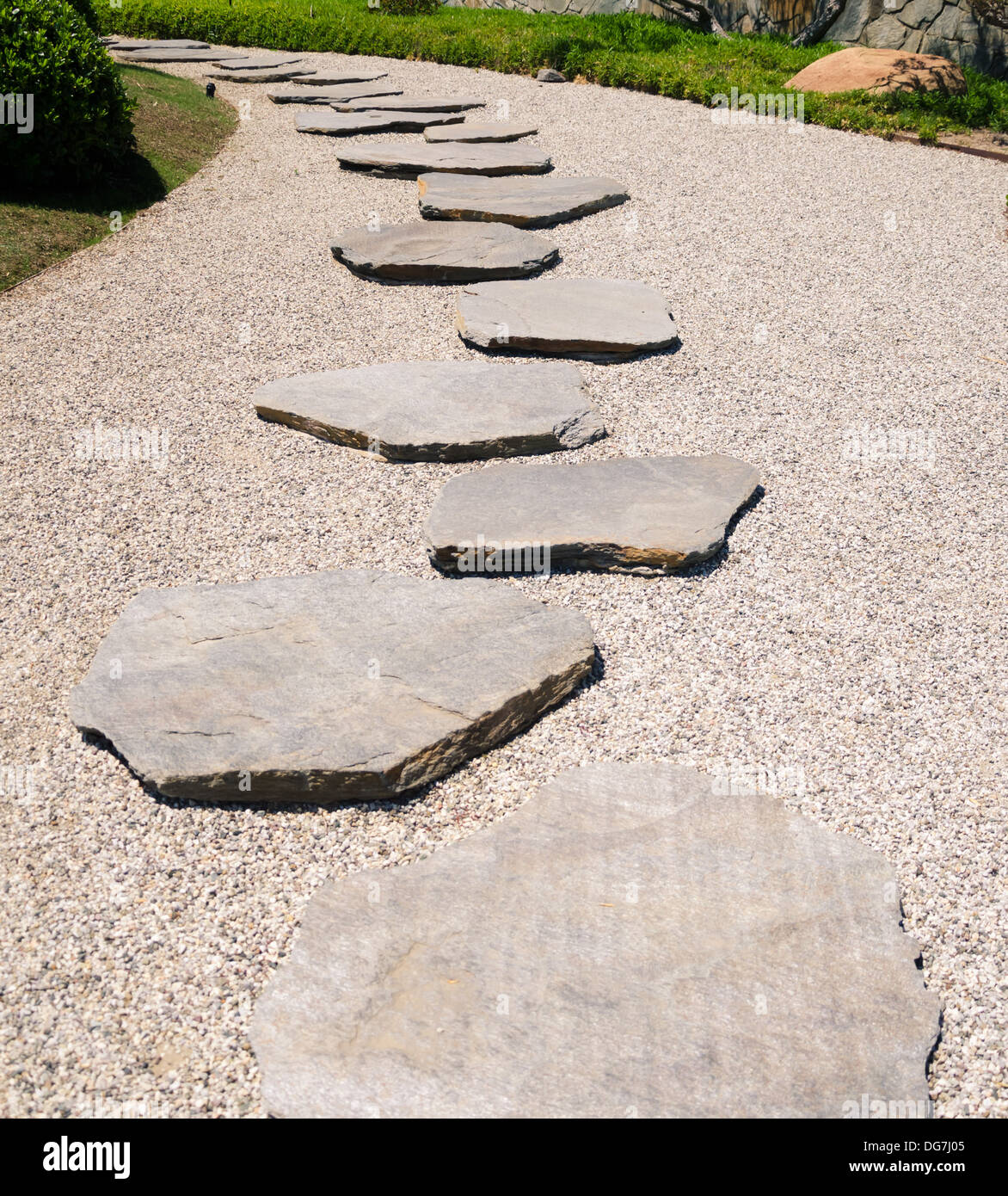 Stone's way in the Japanese garden in sunny day Stock Photo - Alamy