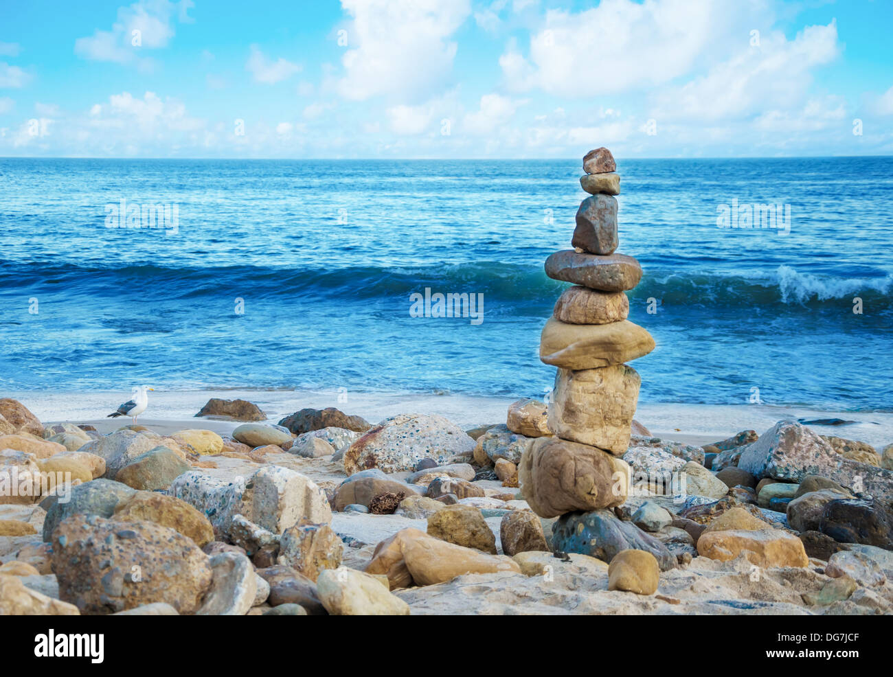 Stack of sea rocks balancing by Pacific ocean Stock Photo - Alamy
