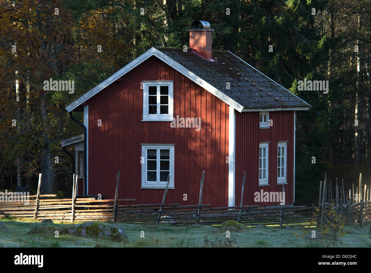 A small house in Sweden with the traditional colours of red with white ...