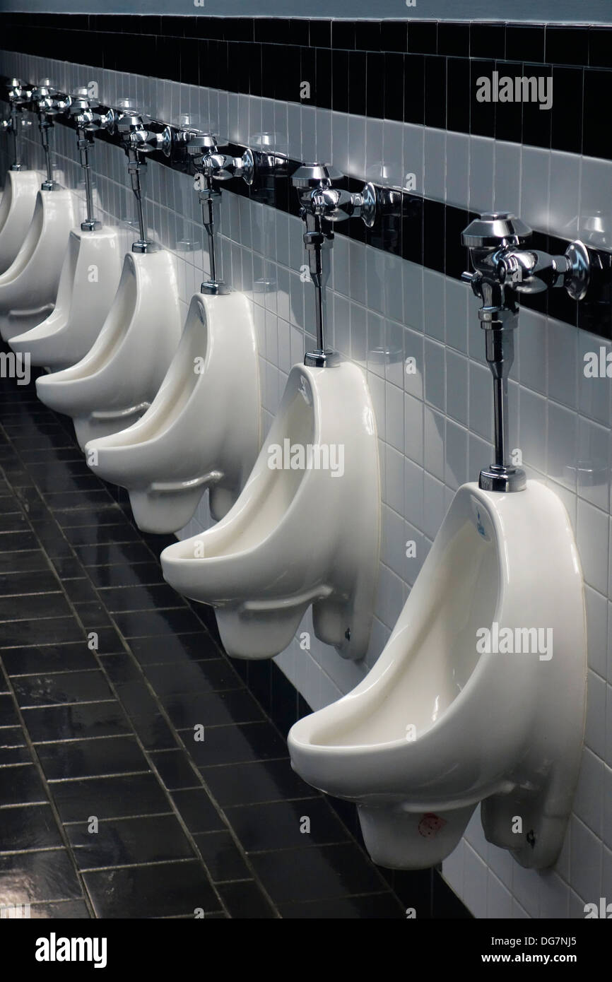 long row of urinals Stock Photo - Alamy