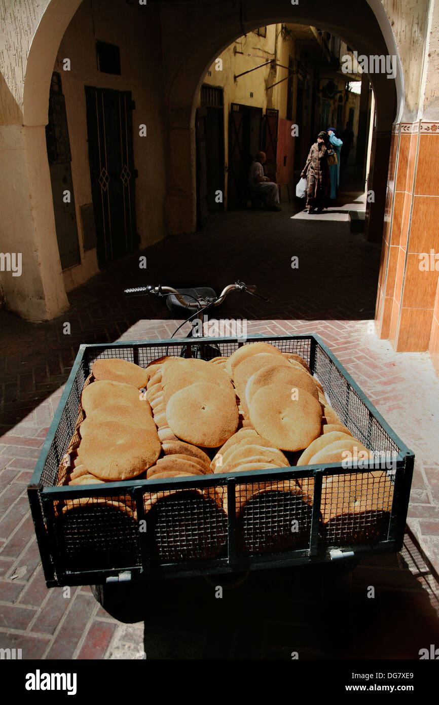 round Bread in motorcycle basket streets in Tangier's Souk Stock Photo ...