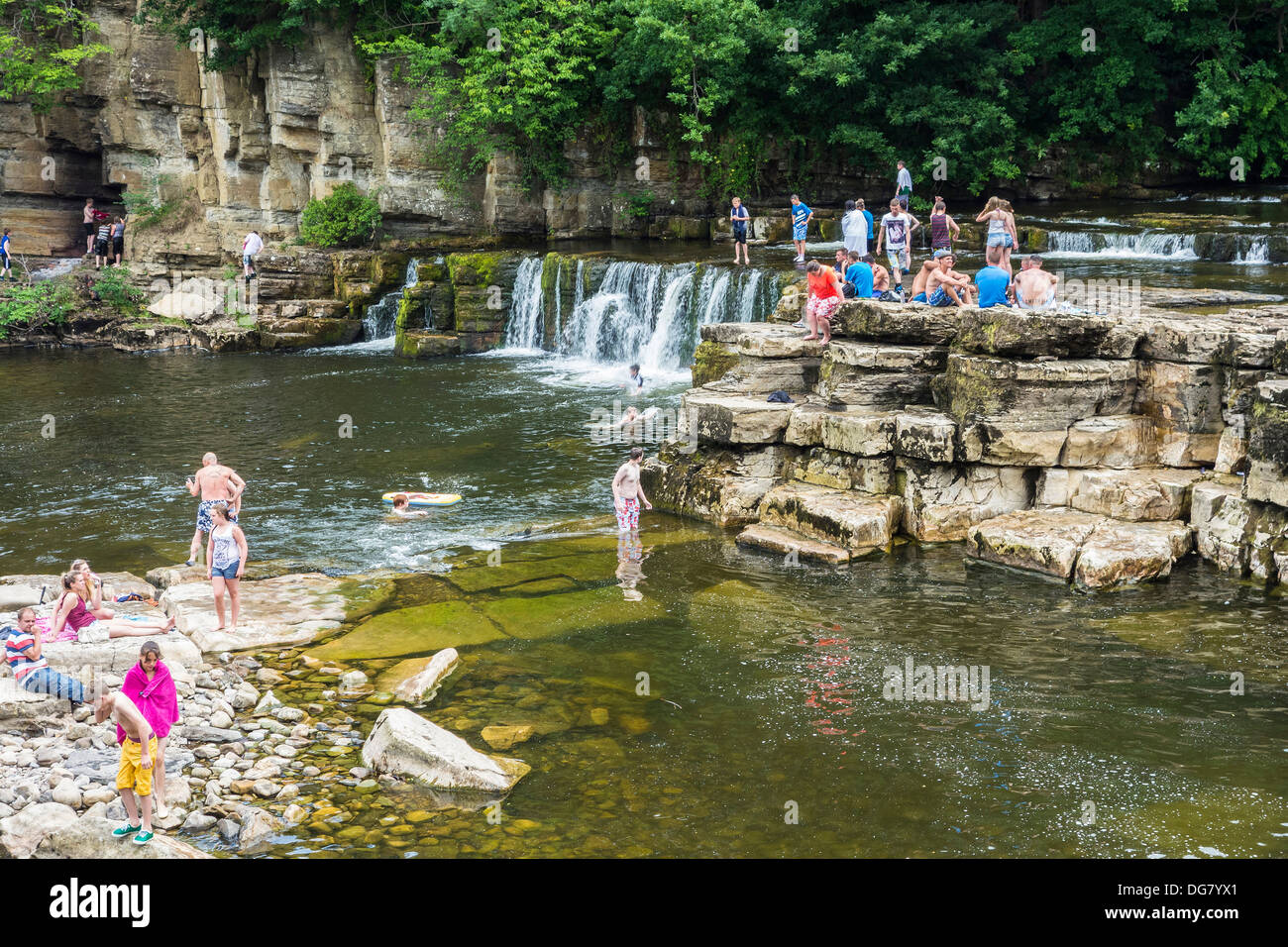 Summer swimming in the River Swale at Richmond, North Yorkshire Stock ...