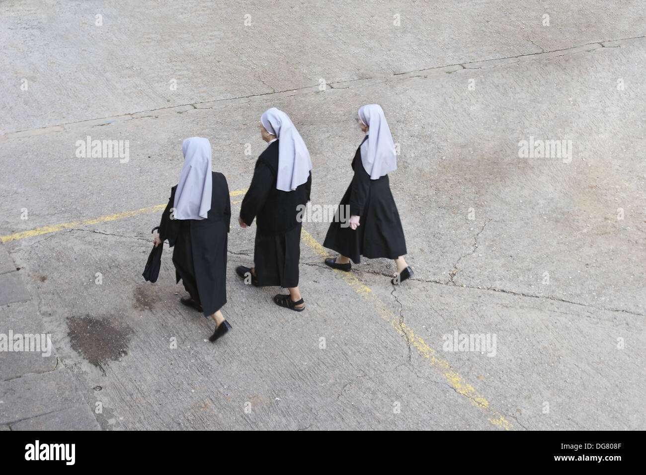 Three nuns walking hi-res stock photography and images - Alamy
