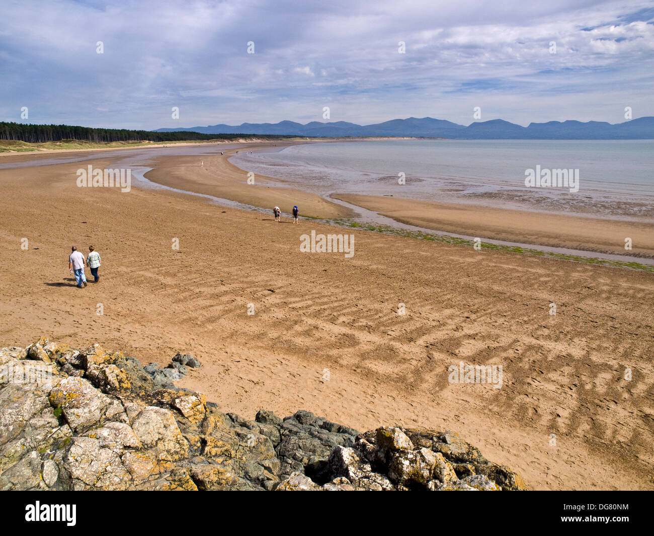 People walking on Newborough beach, Anglesey, North Wales UK Stock ...