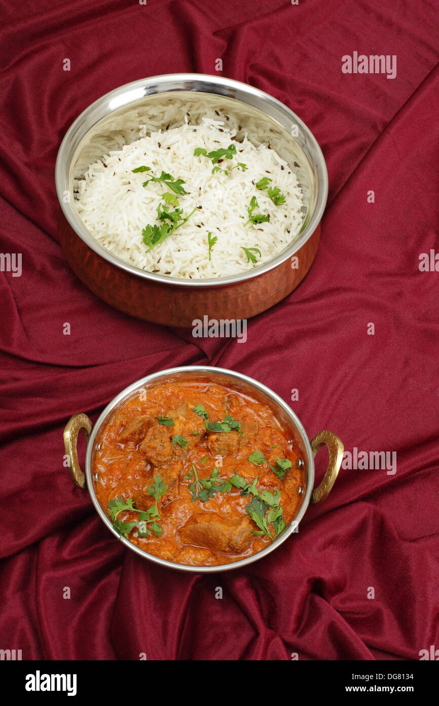 Lamb rogan josh, served with jeera (cumin) rice Stock Photo - Alamy