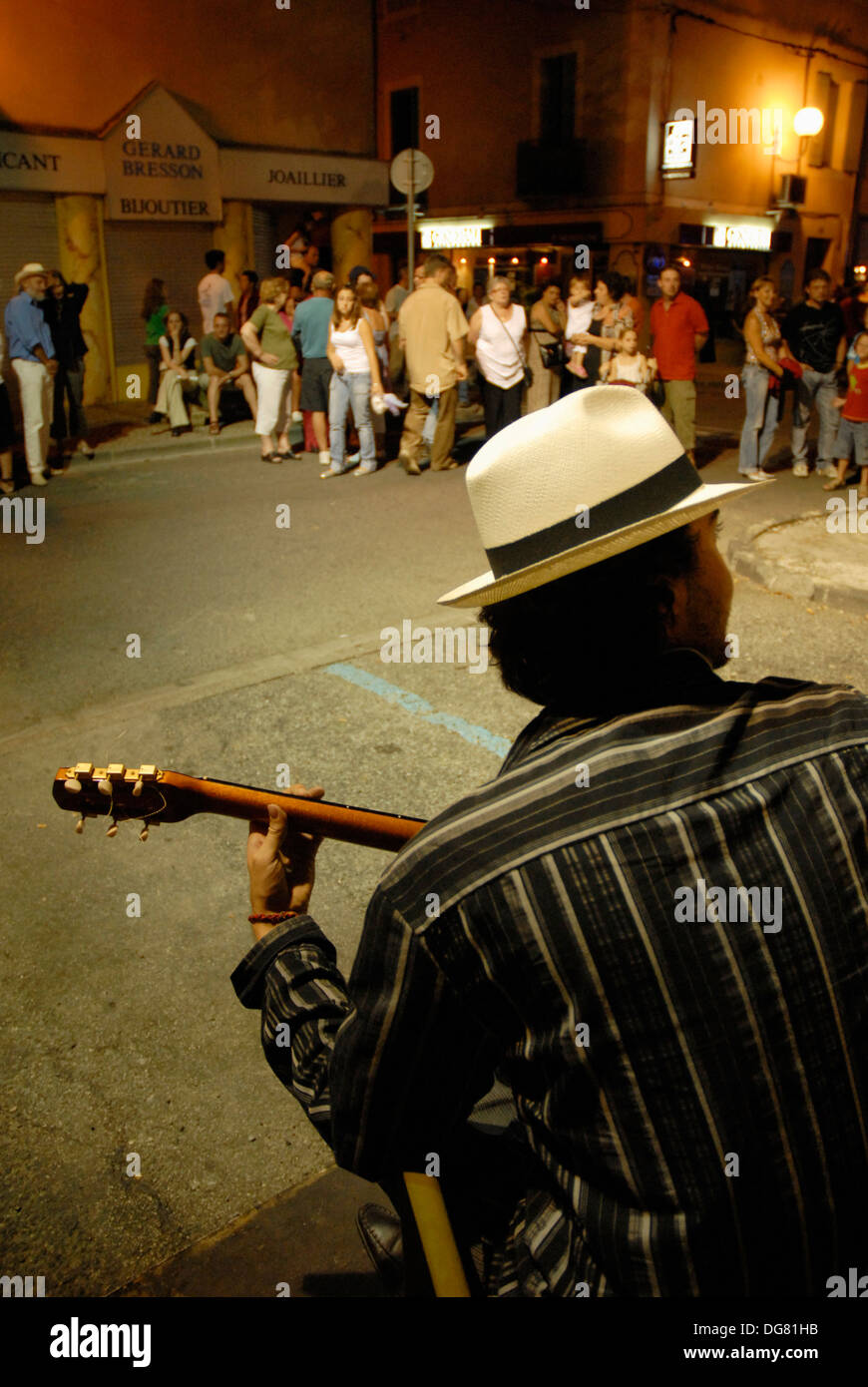 Plays music street hi-res stock photography and images - Alamy