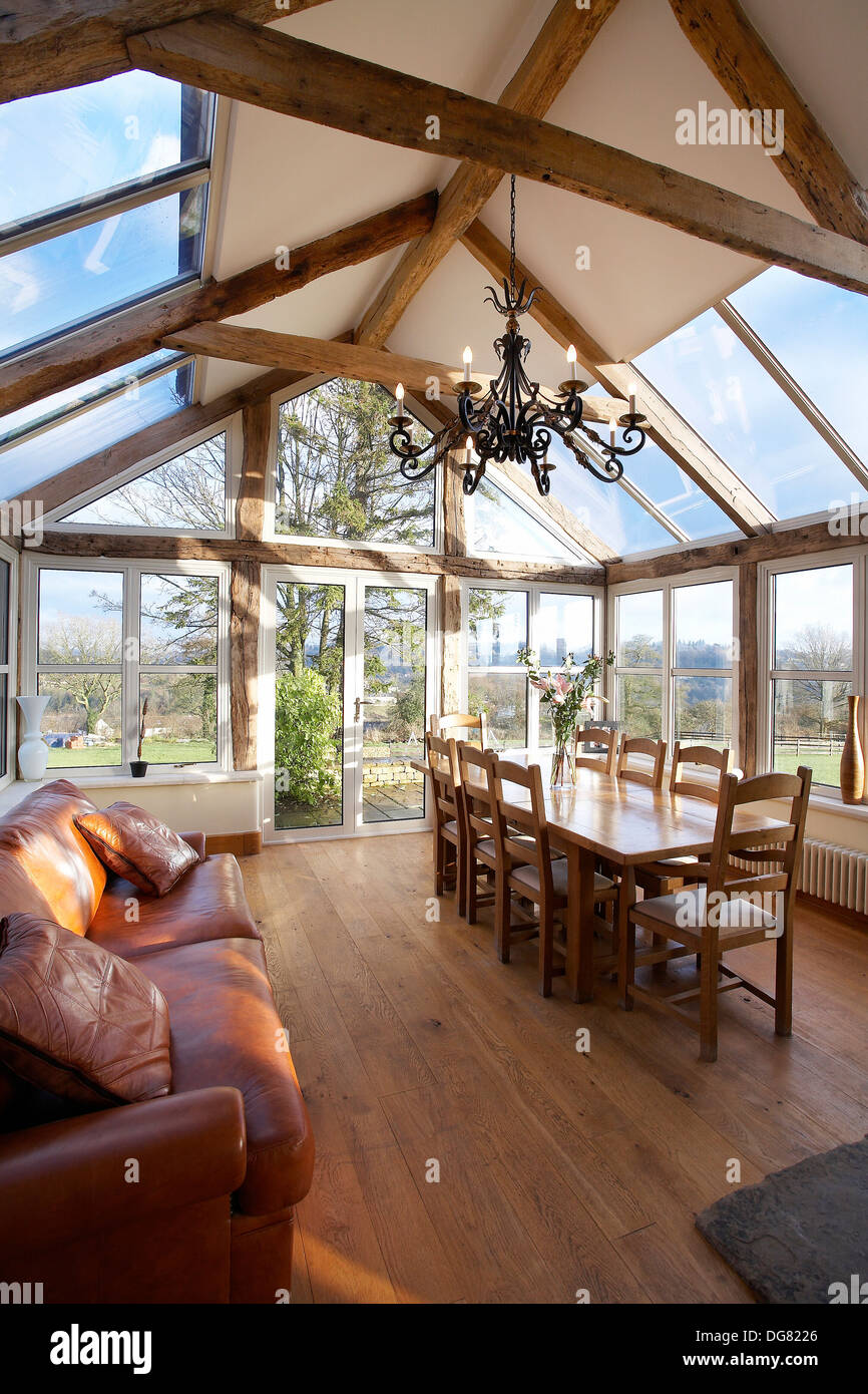An Orangery type conservatory interior of a house with oak frame, in ...