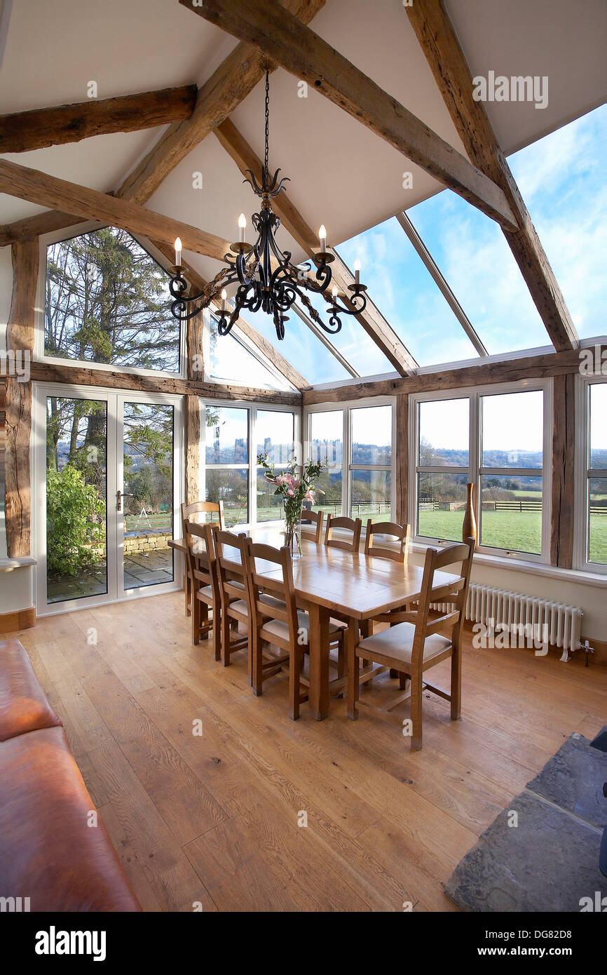 An Orangery type conservatory interior of a house with oak frame, in ...