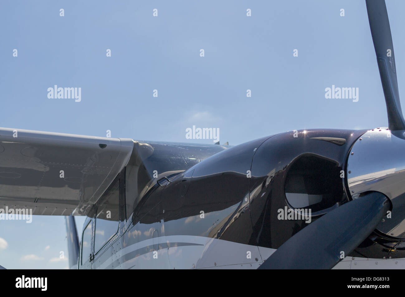Nose and cockpit view of a private airplane - Cessna Turbo 206 against ...