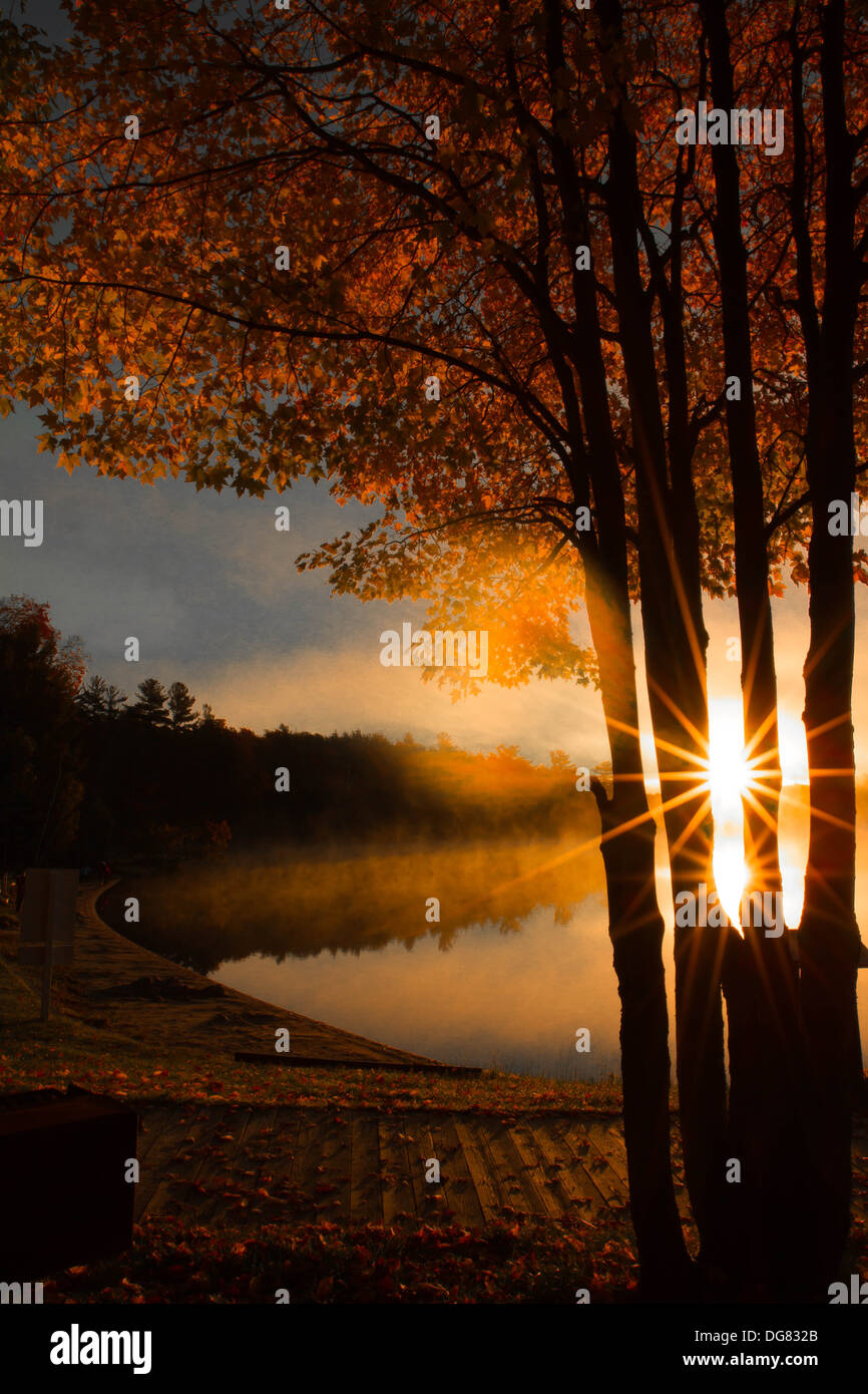 Morning at the Michigan Upper Peninsula Park in autumn at sunrise with ...