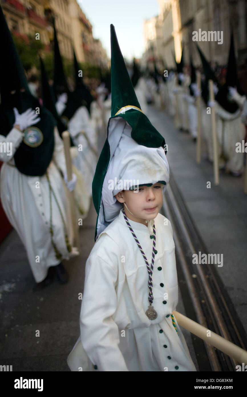 Young penitent with raised hood Stock Photo - Alamy