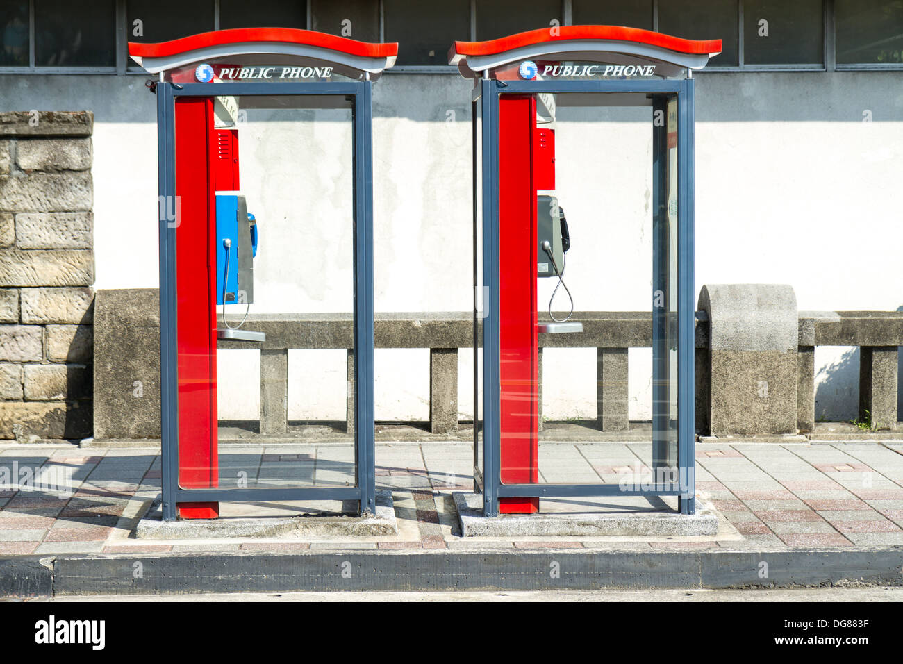 Two telephone booths on a sidewalk in Taipei, Taiwan Stock Photo - Alamy