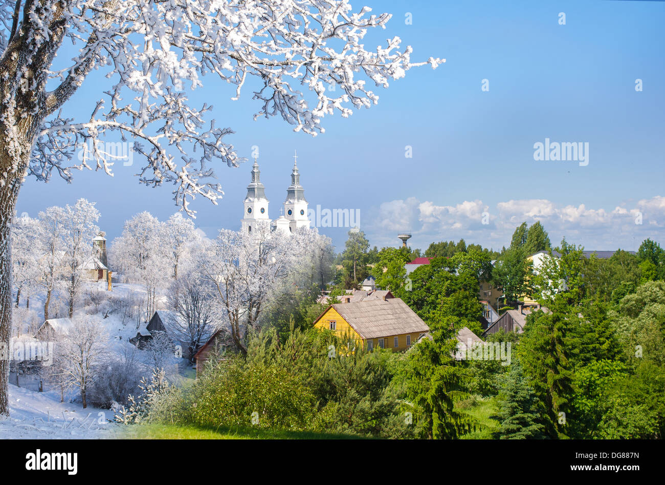 Cold winter and hot summer in one photo. Lithuania, Zemaiciu Kalvarija ...