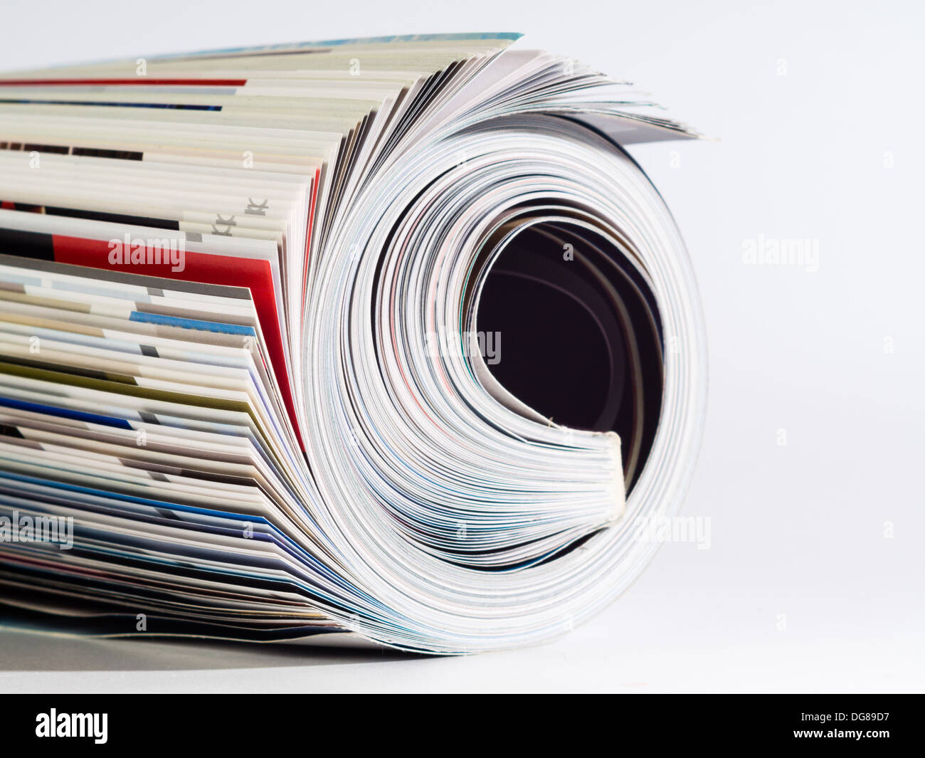 Rolled up newspaper hi-res stock photography and images - Alamy