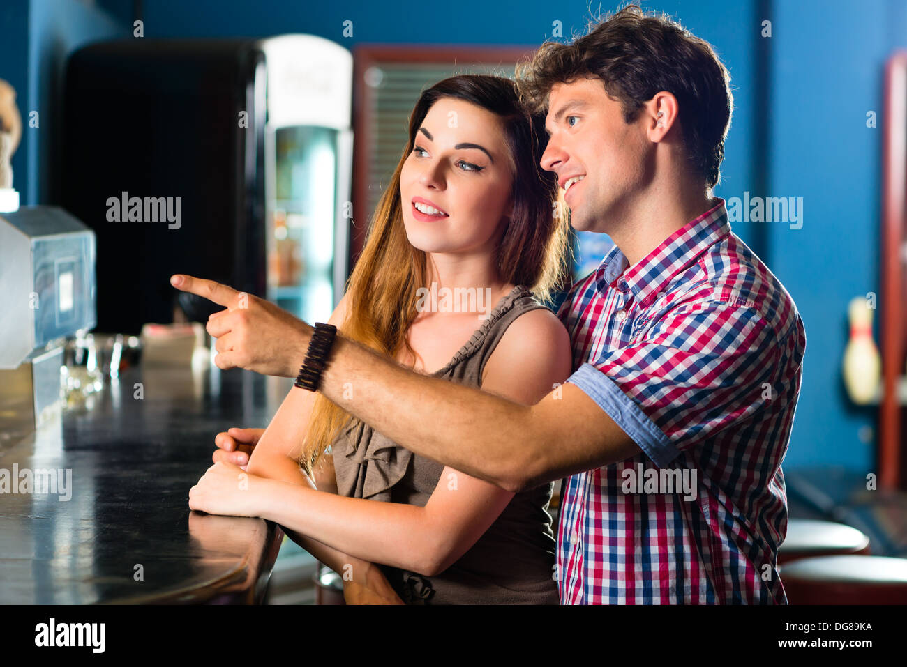 Couple flirting in bar hi-res stock photography and images - Alamy