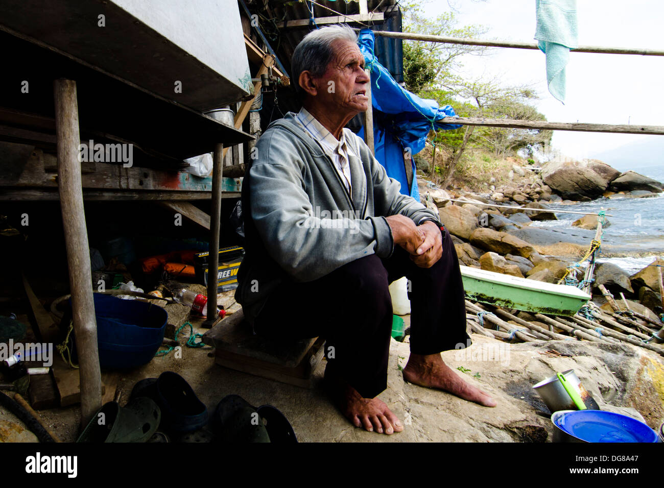 local old fisherman at Buzios island, Ilhabela, north shore of Sao ...