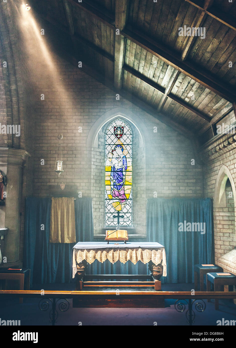 Light shining on Holy Bible in old English Cathedral Stock Photo - Alamy