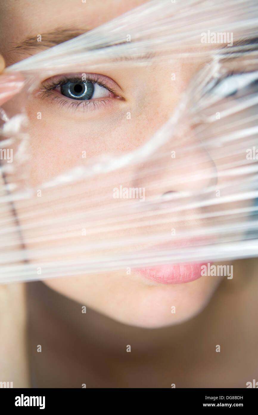 Woman face plastic film hi-res stock photography and images - Alamy