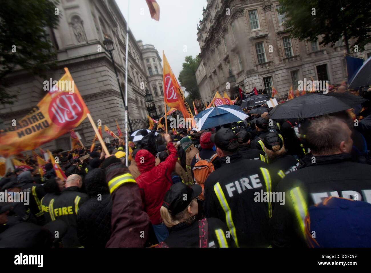 London UK. 16th October 2013. Firemen with banners and flags from the ...