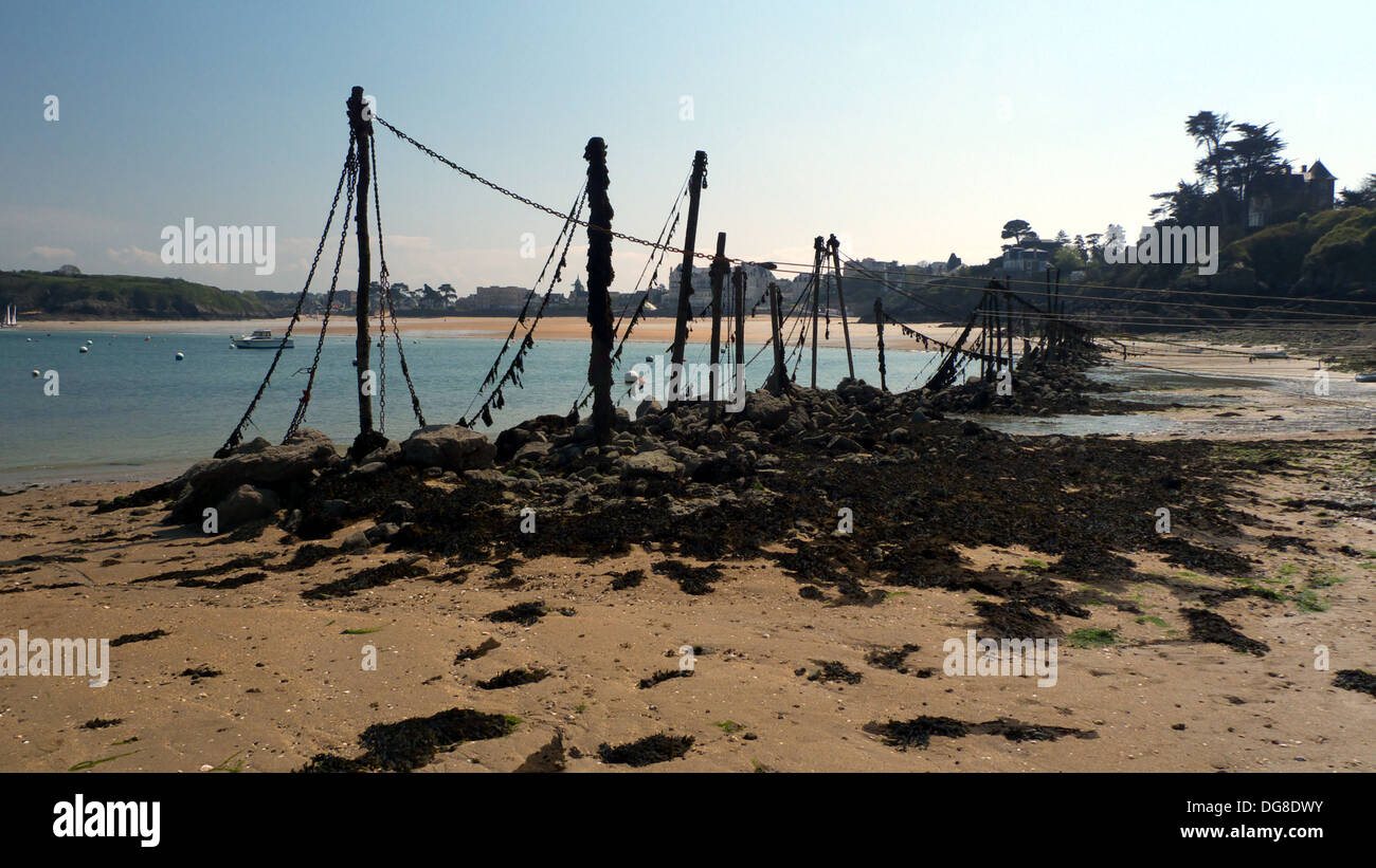 Mooring posts, La Rance estuary Stock Photo - Alamy