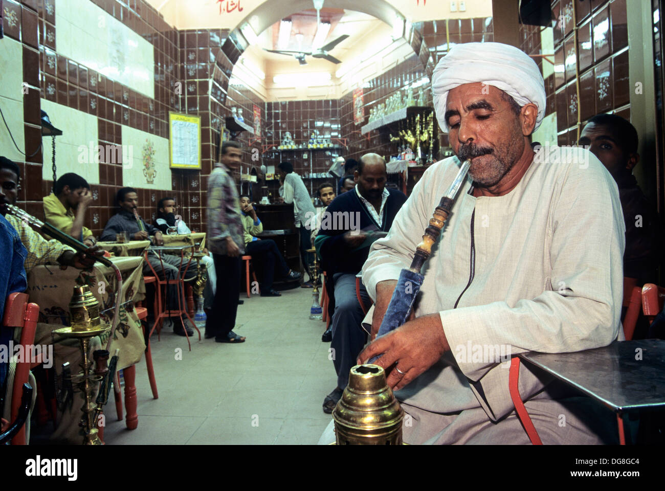 man smoking hooka in a cafe, Aswan, Egypt, Africa Stock Photo - Alamy