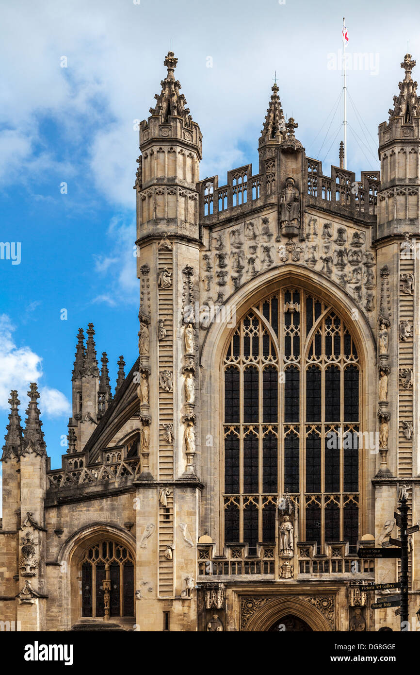 Part of the Gothic west front of Bath Abbey with tourist signs in the ...