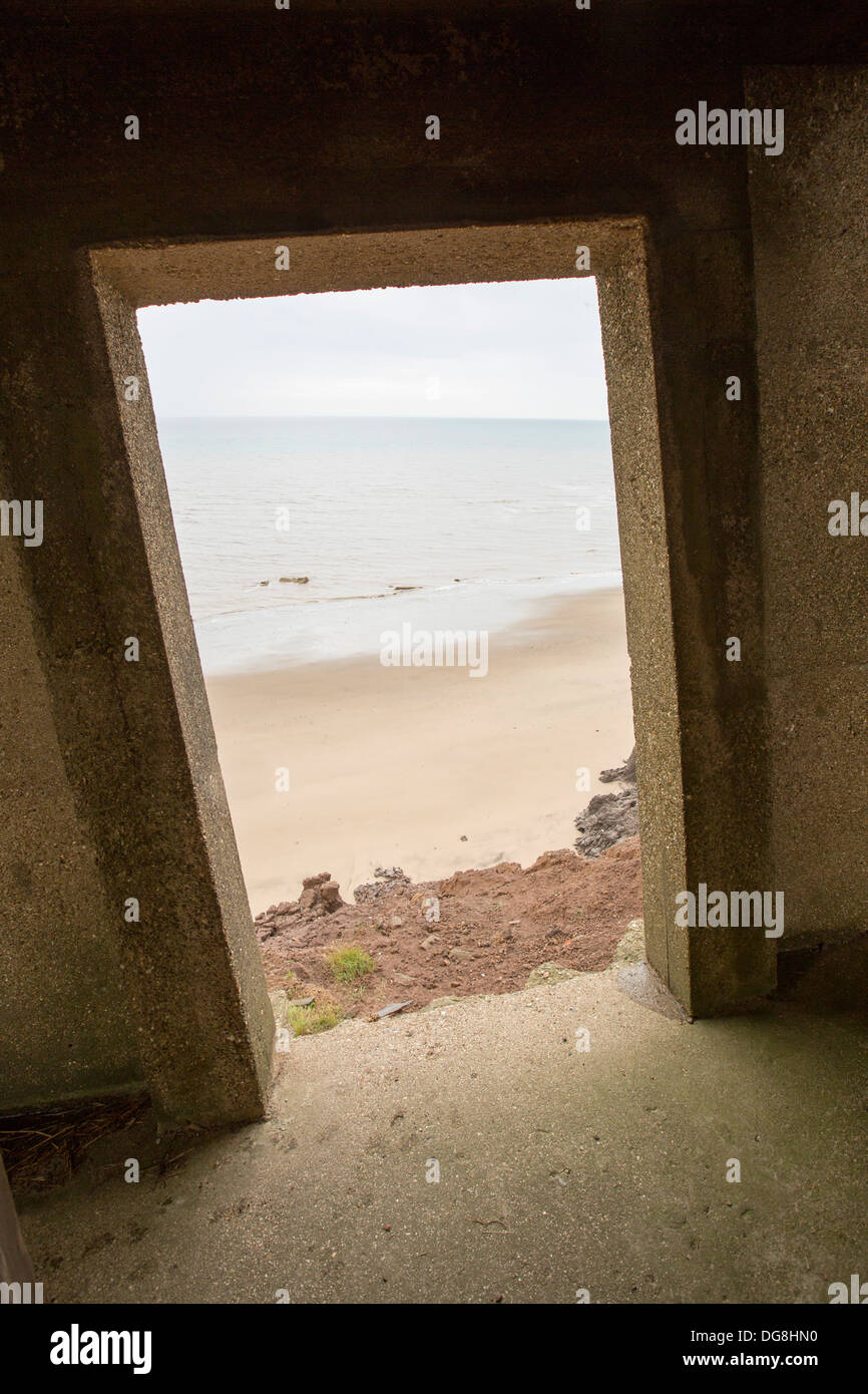 A Second world War lookout post leaning alarmingly and about to tumble ...
