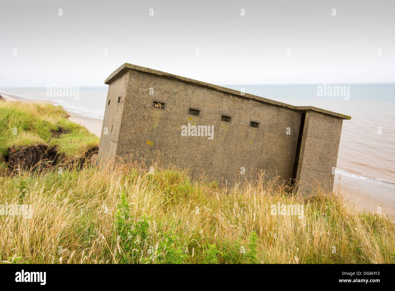 A Second world War lookout post leaning alarmingly and about to tumble ...