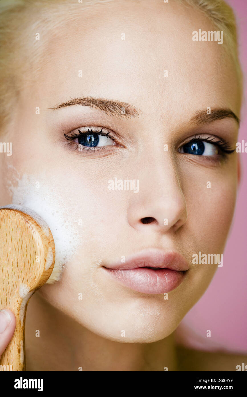 One woman skin brush exfoliate hi-res stock photography and images - Alamy