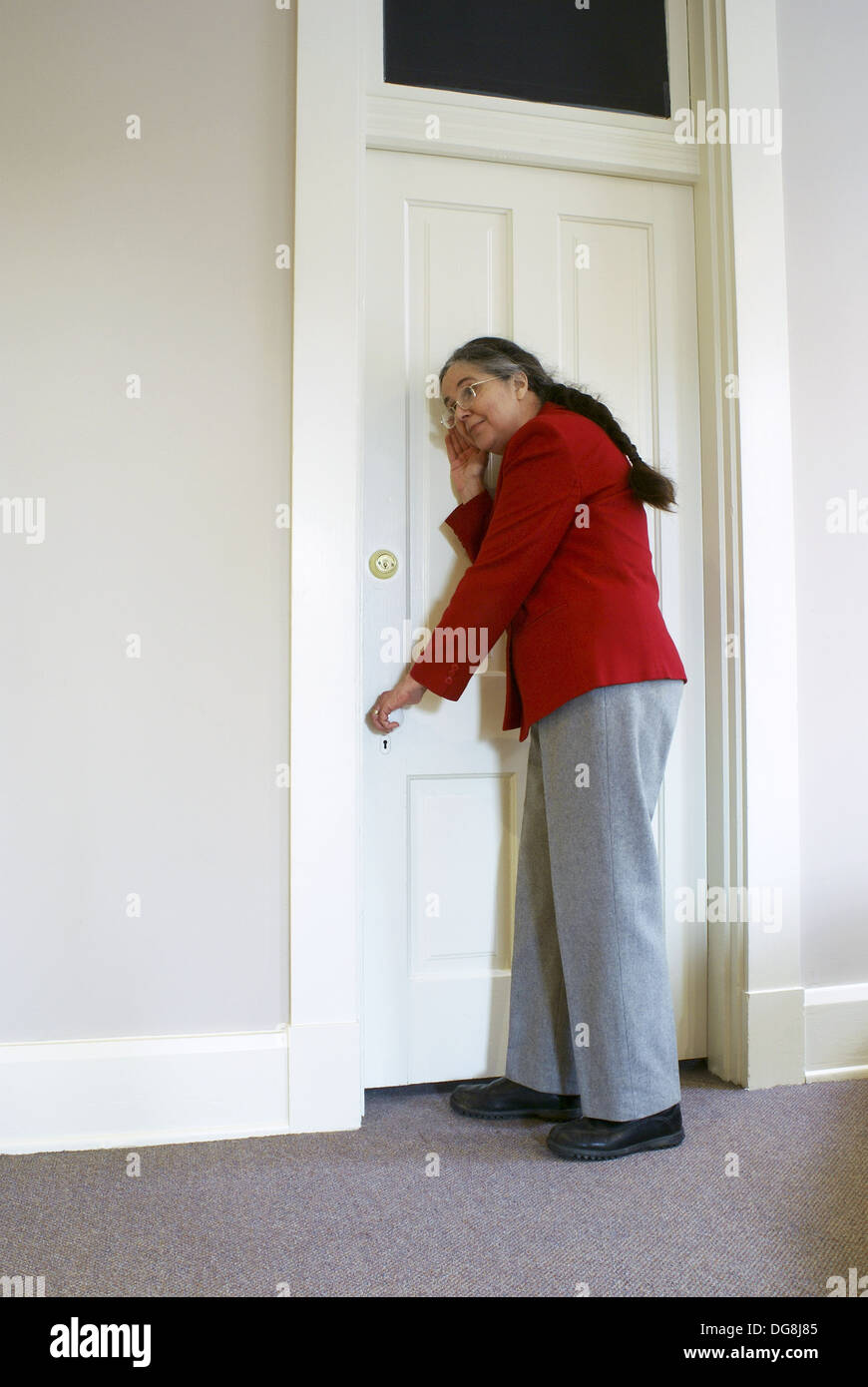 Senior woman spying hi-res stock photography and images - Alamy