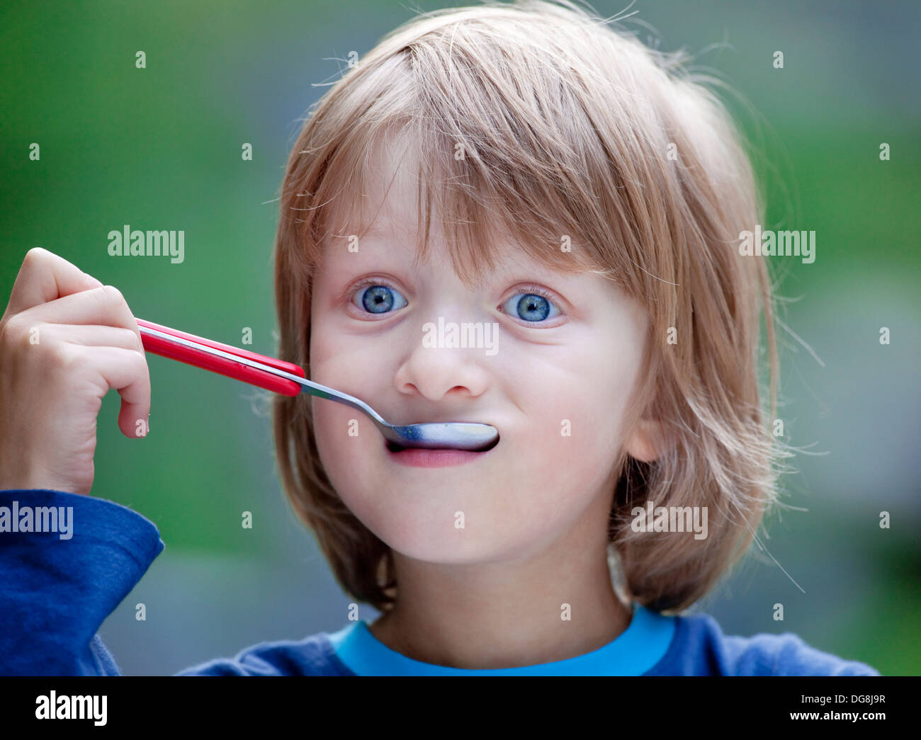 Boy with Blond Hair Eating Soup Stock Photo - Alamy