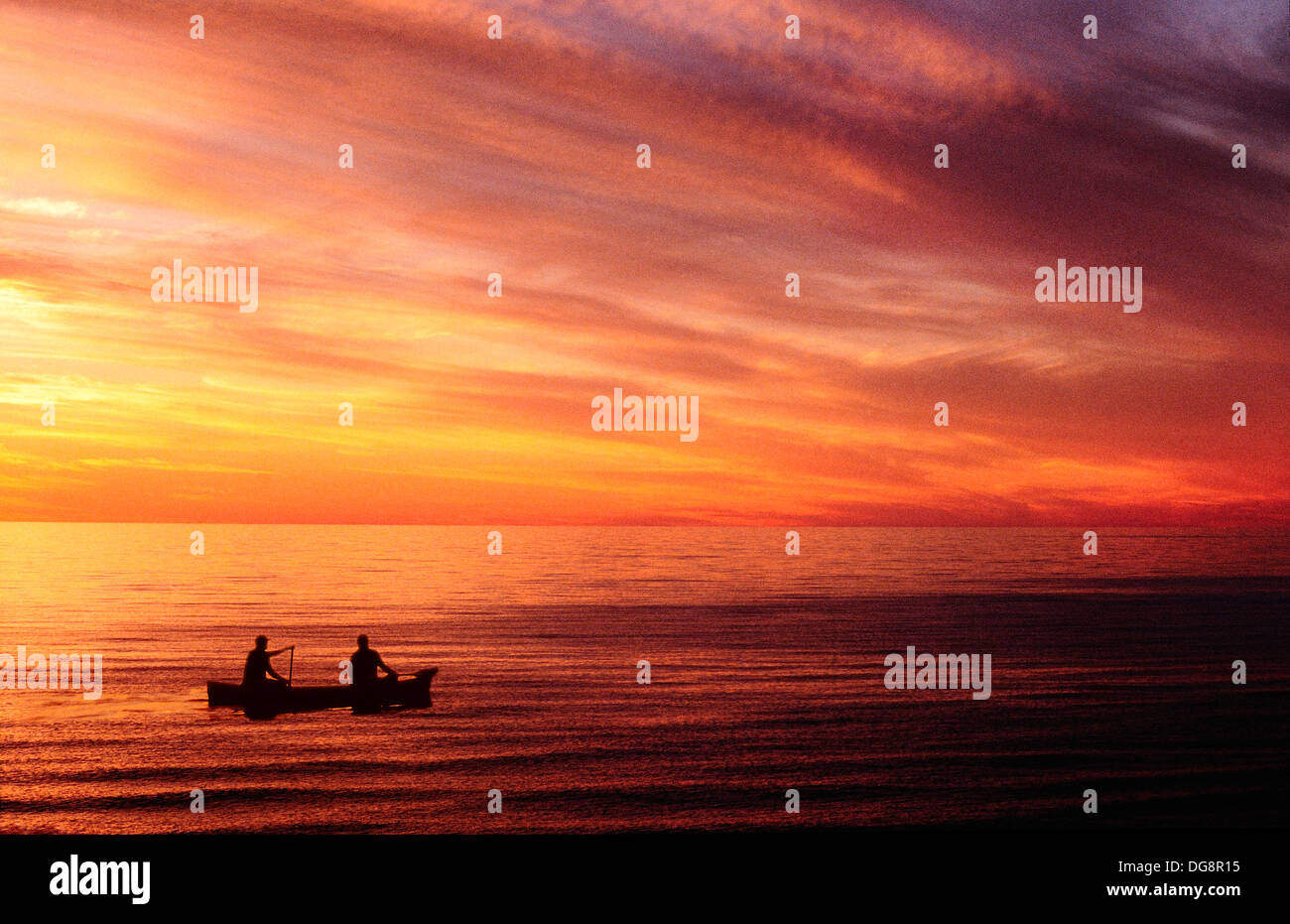 Canoeing at sunset hi-res stock photography and images - Alamy