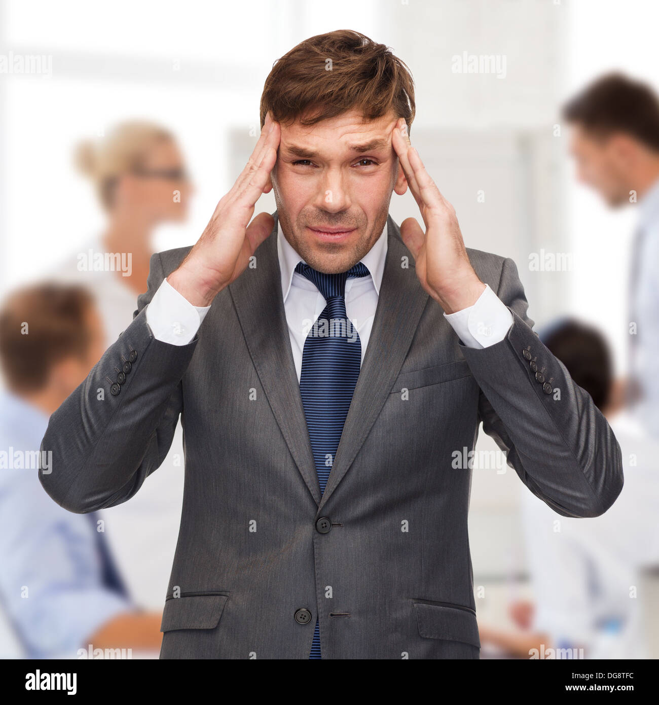 stressed buisnessman or teacher having headache Stock Photo - Alamy