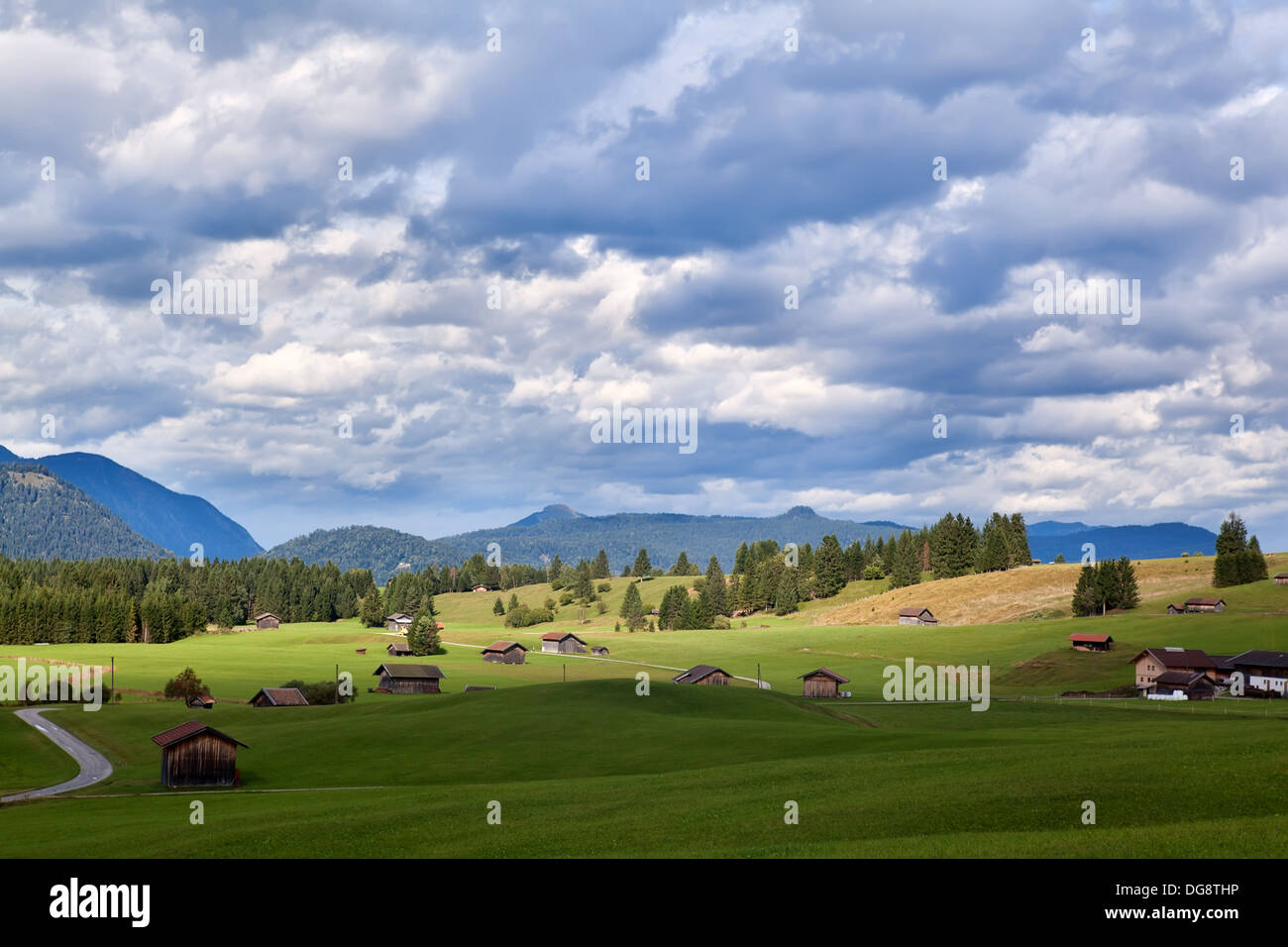 cloudy sky over Bavarian farmland, Alps, Germany Stock Photo - Alamy