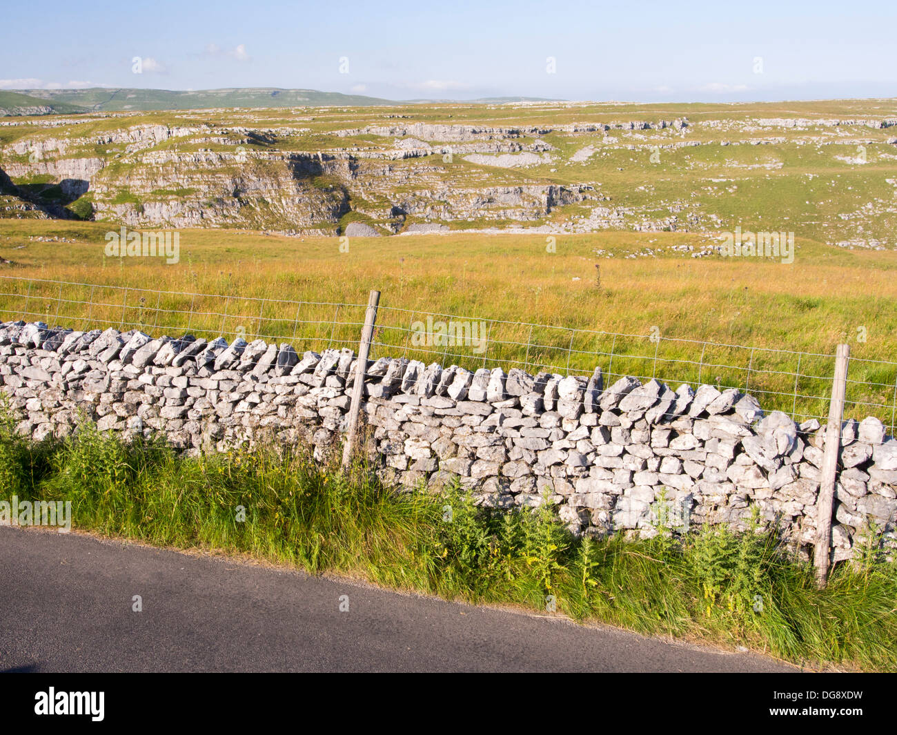A country road out of Malham in the Yorkshire Dales, UK, with limestone ...