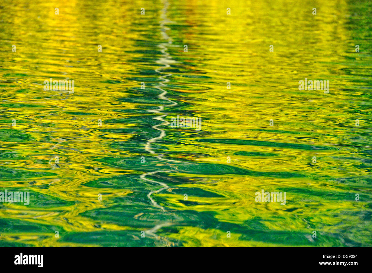 Reflections in the Chilko River in early autumn Chilcotin Wilderness BC ...