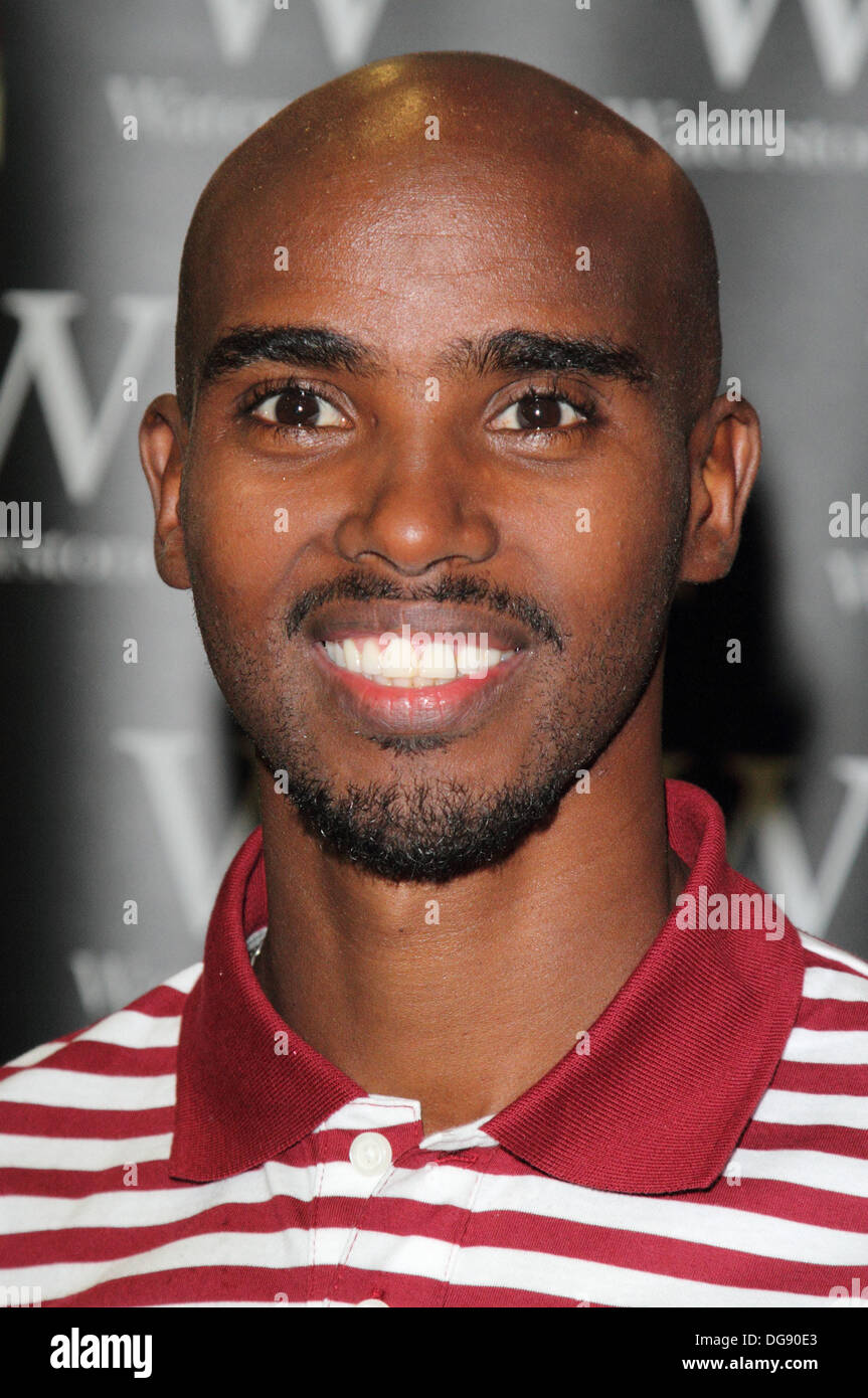 Mo farah signing his autobiography hi-res stock photography and images ...