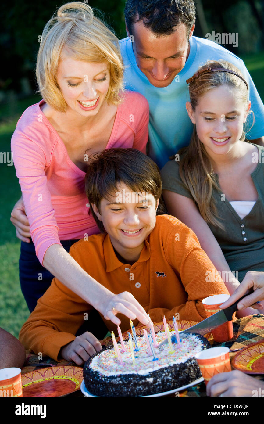 Father son cutting birthday cake hi-res stock photography and images ...