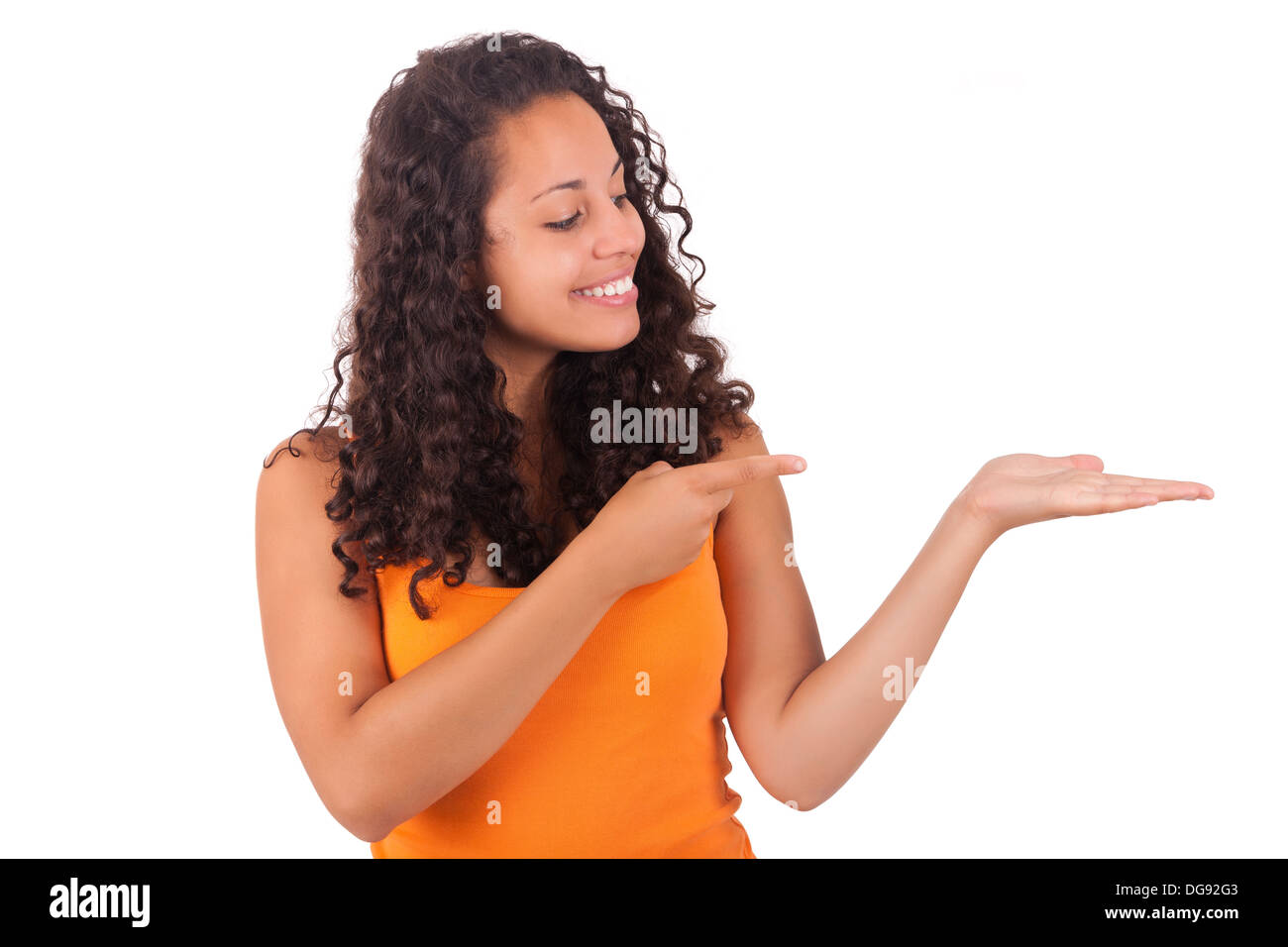 Young african american woman displaying something isolated Stock Photo ...