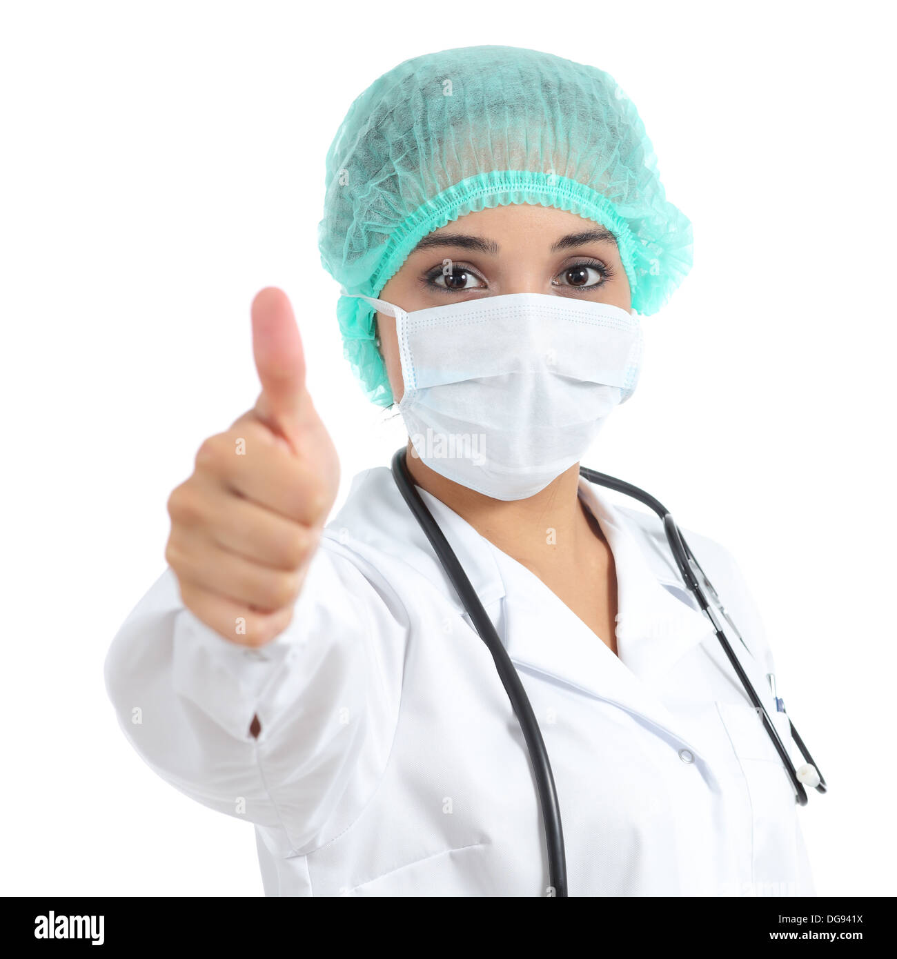 Female doctor with a surgical mask with thumb up isolated on a white ...