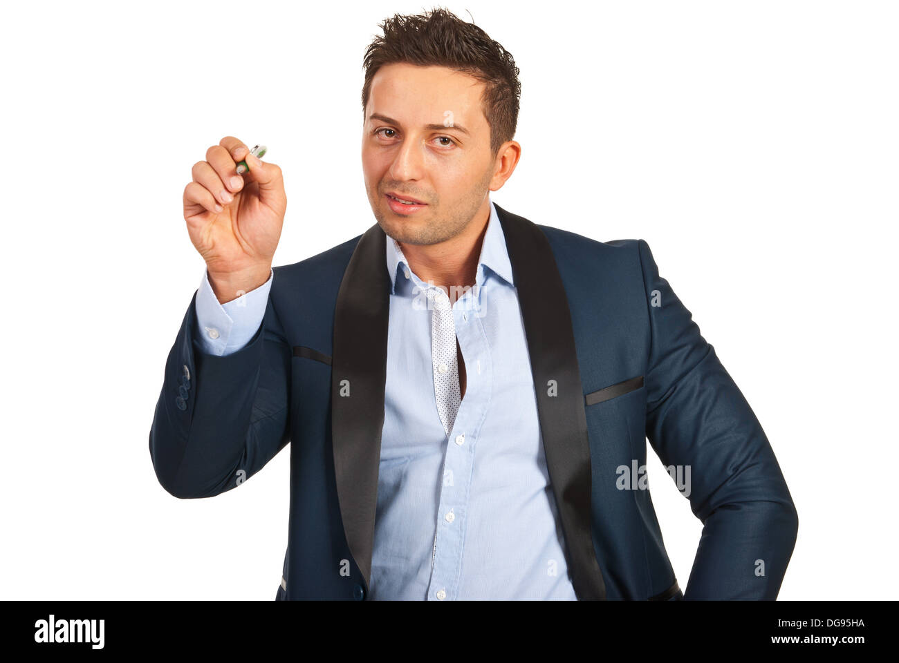 Executive man holding pencil and writing isolated on white background ...