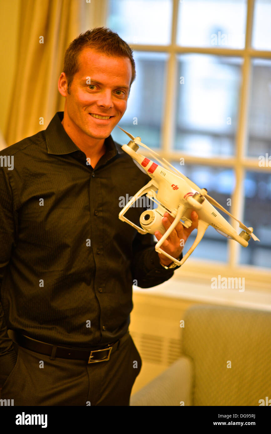 Portrait of Colin Guinn, CEO of DJI Innovations with one of his ...