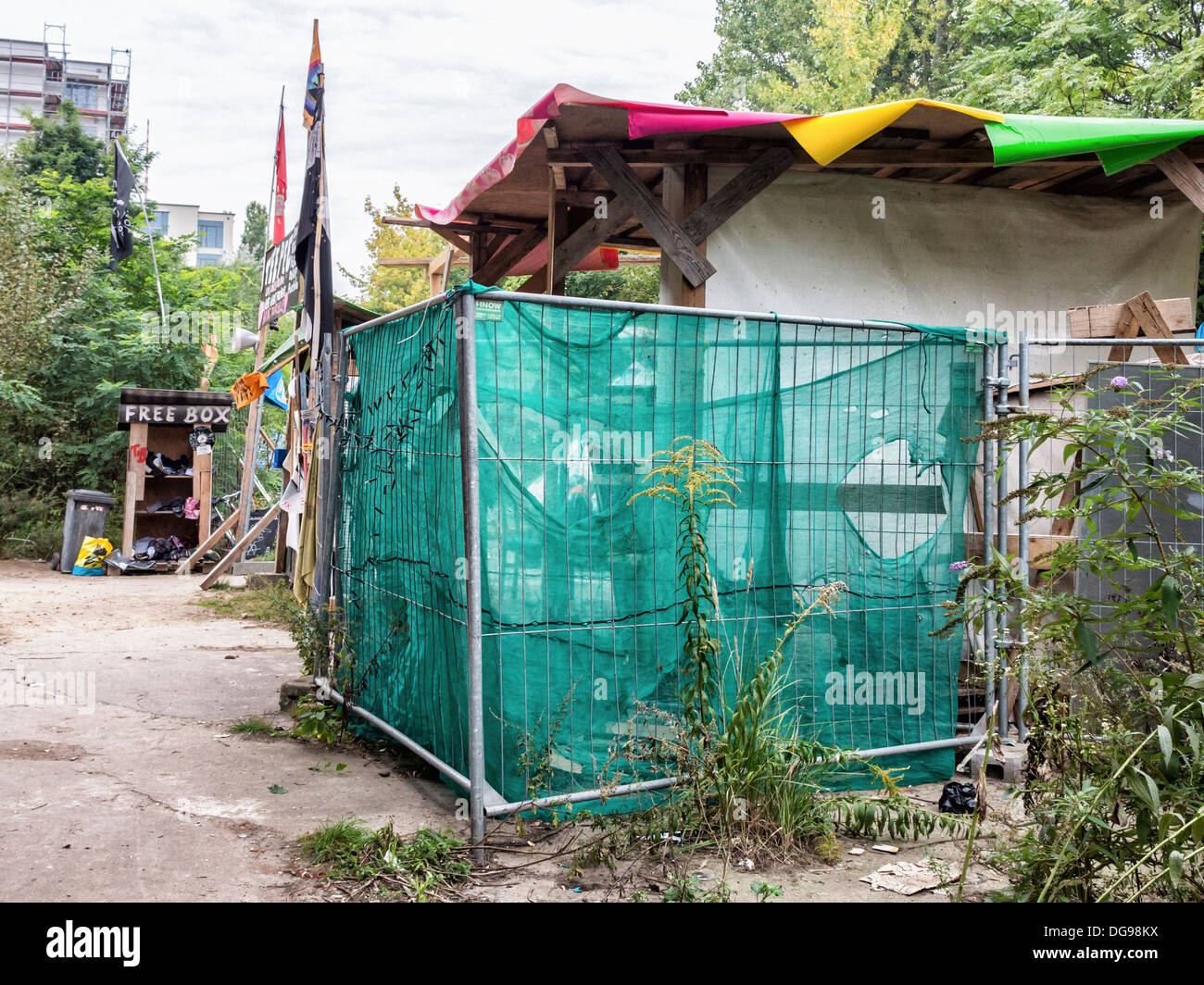 Squatters set up informal tented community using recycled materials to ...