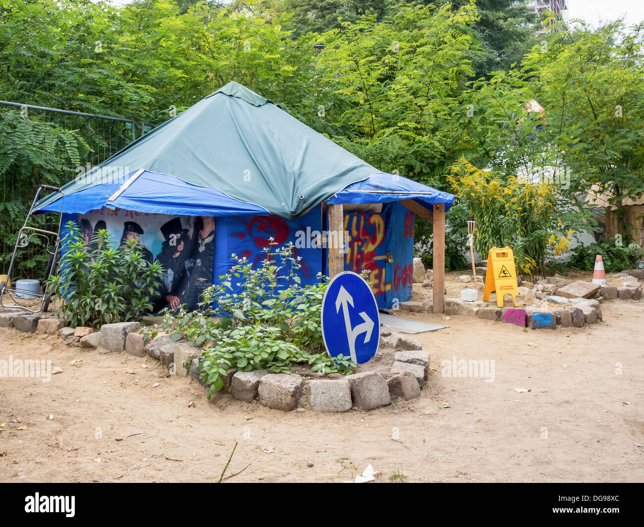 Squatters set up informal tented community using recycled materials to ...